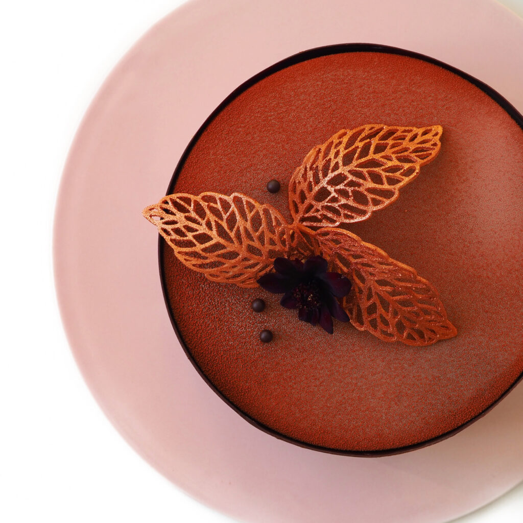 Choko-orange kage I En lækker lille sag med orangeknas